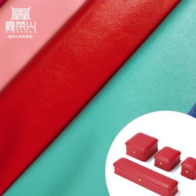 Cina Pvc R64 grano pelle sintetica artificiale per il pacchetto Portafogli Cassa scarpe Notebook tessuto di pelle in vendita