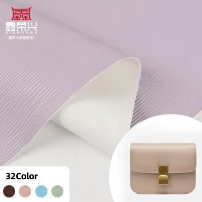 China 1.0 mm Thickness 137cm Width PU Synthetic Leather Fabric with 41 Colors Available for Handbag Shoes Wallet for sale