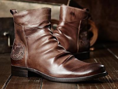 Chine Chaussures à talons rondes pour hommes chaussures à cheville en cuir véritable chaussures d'ascenseur pour hommes à vendre