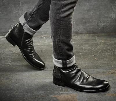 Chine Chaussures à talons rondes pour hommes chaussures à cheville en cuir véritable chaussures d'ascenseur pour hommes à vendre