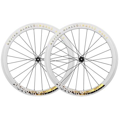 China 36T Ratchet 700C Disc Brake Wheelset Rhomboid Mark Straight Pull Carbon Clincher Wheelset for sale