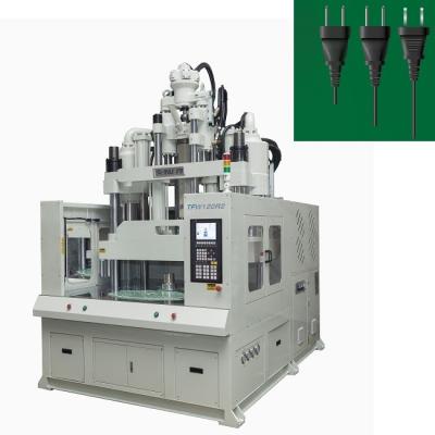 China Máquina de moldagem por injecção de mesa rotativa vertical de 120 toneladas para abrigos de tomadas de energia à venda