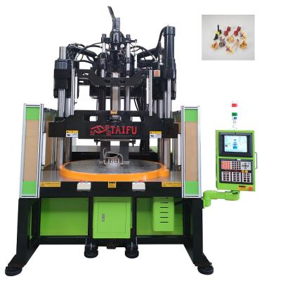China 120 Ton Low Workbench Rotary Table Vertical Injection Molding Machine For Making Toy à venda
