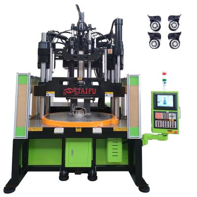 China 120 Ton Low Work Table Vertical Injection Molding Machine For Making Luggage Wheels à venda