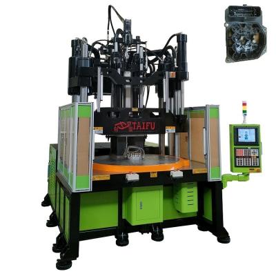 China Low Work Table Vertical Injection Molding Machine For Making ABS Control Module à venda