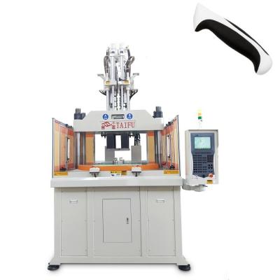 中国 キッチン用具のハンドルに使用される二色垂直プラスチック注射鋳造機 販売のため