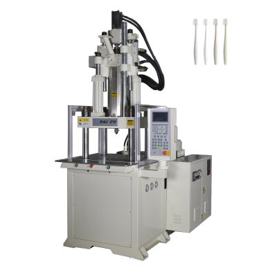 Cina 85 tonnellate Vertical Plastic Product Injection Molding Machine per la fabbricazione di spazzolini da denti in vendita