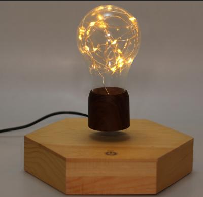 China octagon magnetic levitation FLOATING wireless lamp bulb night light for sale