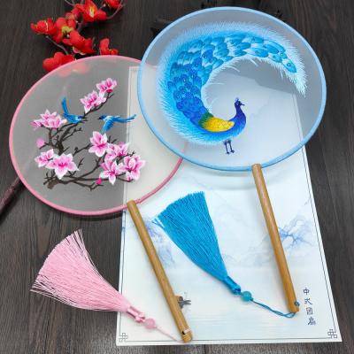 China Y-Z Chinese Round Shape Hanfu Fabric Fan Wood Handle with Tassel Hand Embroidered Ancient Silk Fan for sale