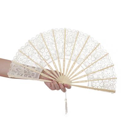 China Y-Z Vintage Wedding Lace Bamboo Folding Fan Hollow Cotton and Linen Dance Bride Tassel Big Hand Fans for sale