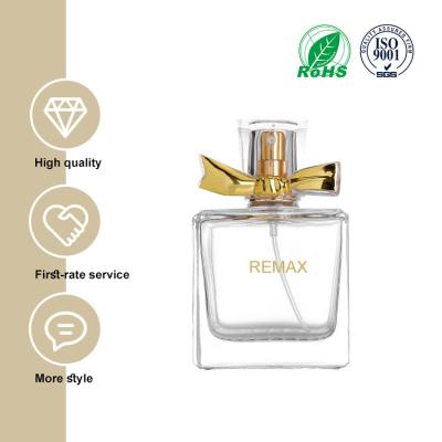 China Luxury 50ml Glass Perfume Bottle 10000pcs With Gold Bow Cap for sale