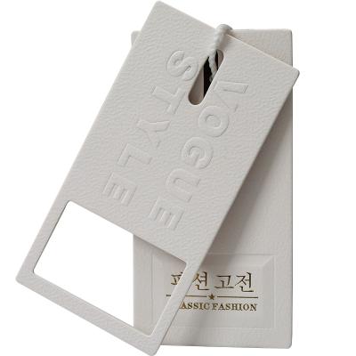 Cina High Texture Grade Apparel Hot Gold Concave Convex Embossed Label Sling Customized in vendita
