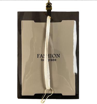 Cina Recyled Apparel PVC Soft Tag Clothes Hanging Tag Customized Logo Tag Plastic Bag in vendita