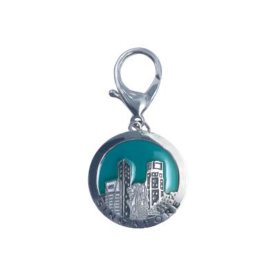 China Llavero de esmaltes translúcidos plateados brillantes de Singapur – Un impresionante homenaje a la elegancia urbana en venta