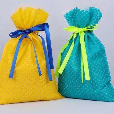 China Waterproof Non-Woven Drawstring Gift Bags 34x42cm Customizable for sale