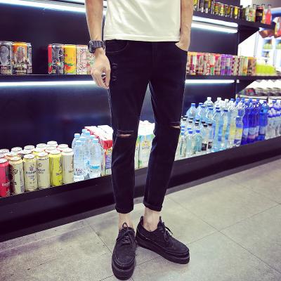 Cina 100 per cento jeans diritti neri della gamba uomini del cotone/del poliestere con i fori irrestringibili in vendita