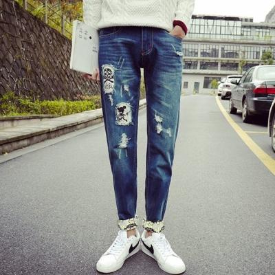 Cina Le donne stampate dei fiori dimagriscono la pietra media di aumento dei jeans diritti della gamba lavata in vendita