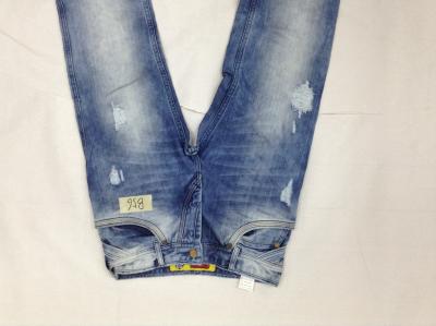 Cina Gli uomini del tessuto del denim del cotone dimagriscono il lavaggio a prova di fuoco degli enzimi dei jeans diritti della gamba in vendita