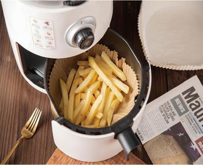 Chine Les revêtements de papier de parchemin de friteuse carrée jetable d'air catégorie comestible antiadhésif à vendre
