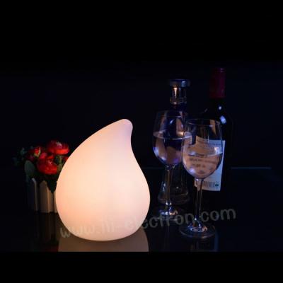 Cina colorful peach shape plastic modern table lamp for party decor in vendita