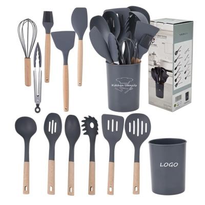 Cina Tutti i colori utensili da cucina 12 pezzi silicone accessori da cucina con maniglie di legno in vendita