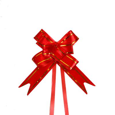 Cina Linee istantanee di plastica dell'oro della farfalla 18mm degli archi di tirata dell'involucro di regalo in vendita
