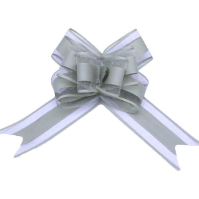 Cina la tirata del nastro della decorazione del regalo 4inch piega l'arco d'argento di tirata della farfalla in vendita