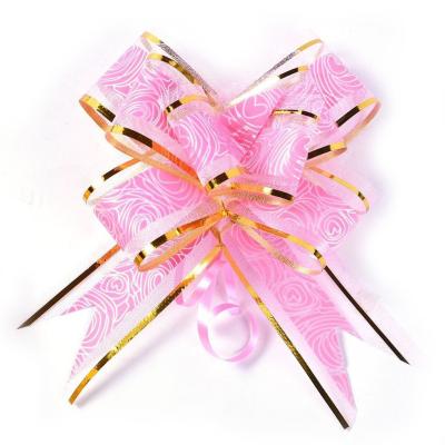 Cina Il piccolo nastro dell'arco di tirata della farfalla 32mm rotola il colore rosa dell'organza di Rosa in vendita