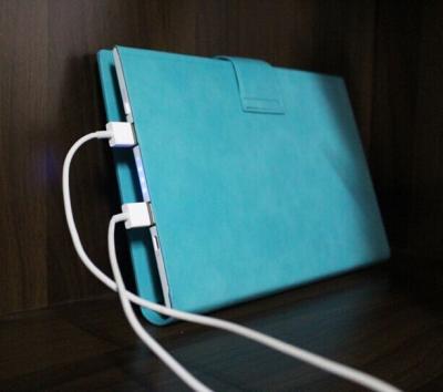Cina la Banca portatile esile eccellente 9000mah di potere del taccuino del cuoio dell'unità di elaborazione del cellulare di 6mm in vendita