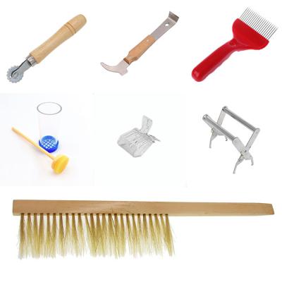 Cina Strumenti di apicoltura, strumenti dell'ape, strumenti dell'ape, spazzole dell'ape, clip del pettine, miele che taglia le Percelle, bottiglie di segno della ruspa spianatrice in vendita