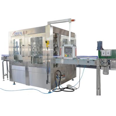 Cina High Speed Plastic Bottle Oil Filling Machine Gravity Type Filling Line in vendita