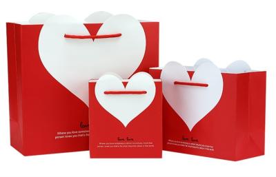 中国 カスタマイズされた白く小さいギフトはロープのハンドルと Foldable 結婚祝い袋を袋に入れます 販売のため