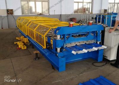 Cina Tetto d'acciaio idraulico di taglio 5.5kw che rende a macchina 6500mm il rotolo del pannello dell'AG precedente in vendita