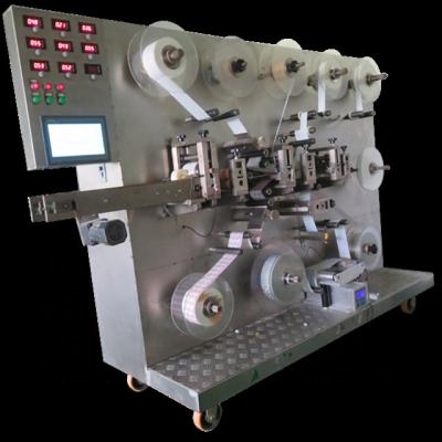Cina Macchina per cerotti KC-2000-E per la produzione di gesso di primo soccorso prodotta in modo efficiente in vendita