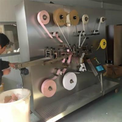 Cina 1100 kg di alta capacità KC-2000-B Banda Aid Packaging Machine con guscio inossidabile in vendita