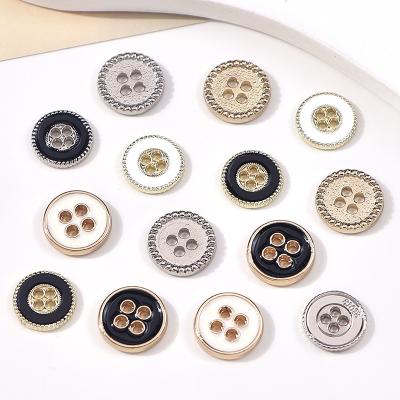 China Customized Round 4 Hole Metal Alloy Button Fashion Trends Flat Sew Button For Garment Clothes for sale
