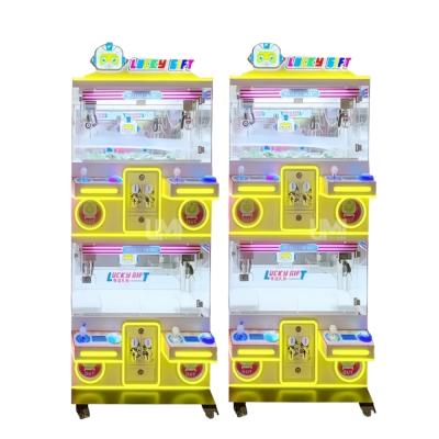 China Wholesale Custom Logo Mini Claw Crane Machine 4-Player Vending Arcade Game with Light Plush Toy Gift Claw Vending Doll Machine for sale