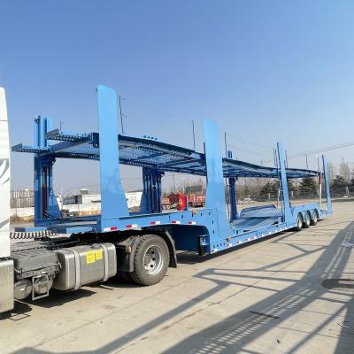 Chine Charge utile maximale hydraulique à double pont, châssis en acier, semi-remorque pour véhicule de transport à vendre