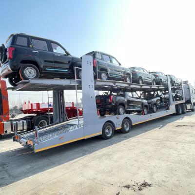 Chine Charge utile maximale de 40 tonnes en acier à double pont 8 véhicule de transport semi-remorque avec cylindre hydraulique à vendre