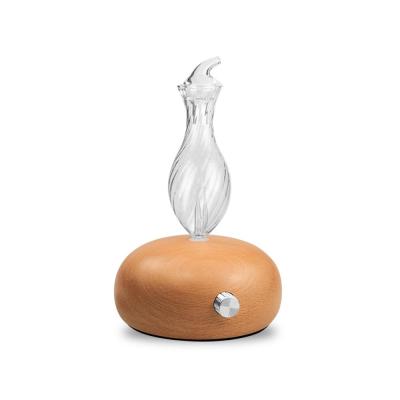Cina Art Wood Essential Oil Nebulizer che gira il diffusore leggero di vetro dell'aroma 30ml per il bambino in vendita
