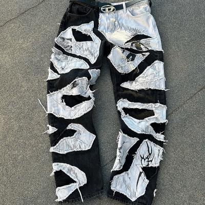 China Custom Vintage Streetwear Jeans with 3D Print and Distressed Patch Slim Fit Hip Hop Denim Pants for sale