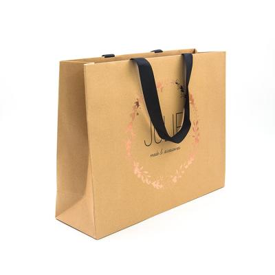 China Personalised Brown Paper Bags Embossed Debossed Surface Finishing Treatment for sale