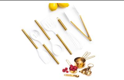 Cina L'utensile della cucina del silicone dell'oro e di bianco mette il supporto dell'utensile dell'oro in vendita