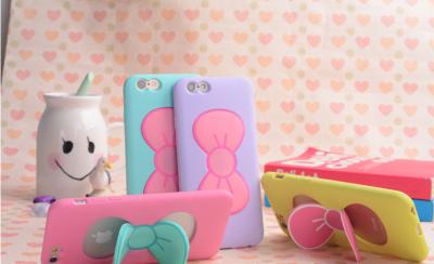 Cina Le casse molli del telefono del silicone di funzione del supporto di Bowknot per la copertura posteriore di Iphone 6s insaccano in vendita