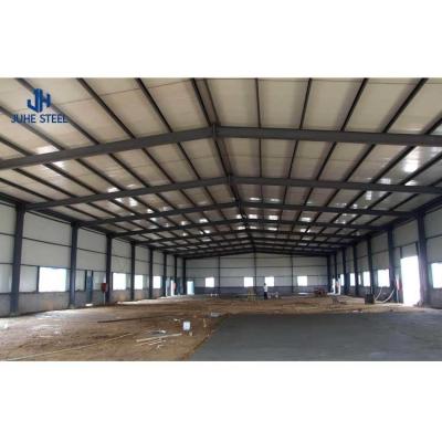 China Steel Portal Frame Workshop Painted Steel Structure Car Parking Lot Warehouse Building for sale