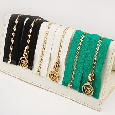 중국 Custom Logo Metal Brass Zipper for Clothing Jean Jacket Teeth Color Customized Color 판매용