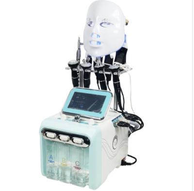 Cina 9 in 1 colore blu della macchina di Hidro Dermabrasion dell'acqua del dispositivo facciale della sbucciatura in vendita
