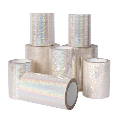 China 28 Microns Glitter BOPP Holograph Fluorographic Hot Lamination Film Glossy Roll for sale