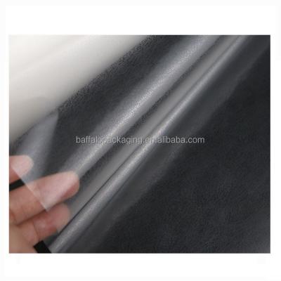 China 26 Micron Adhesive Coated Leather Texture Embossing BOPP Thermal Lamination Film for High End Paper Bags Boxes Photo Albums for sale