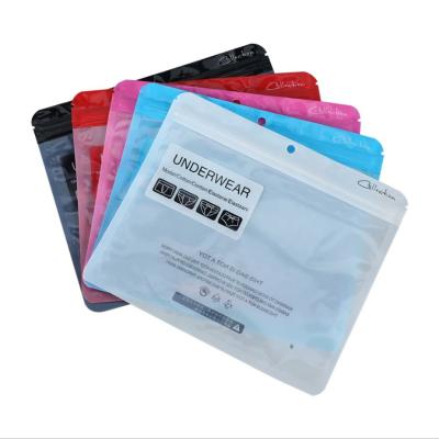 China Custom Printed Clear Underwear Packaging Bags with Hang Hole Multi-layer Zipper Heat Sealable Bag for sale